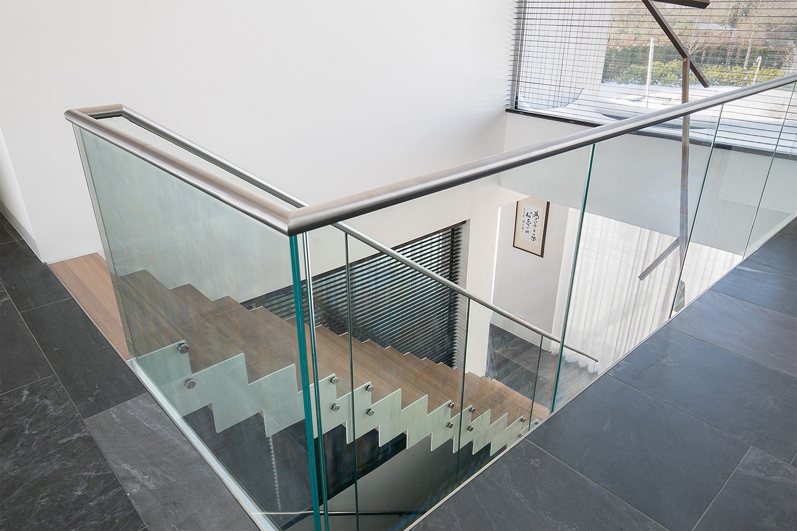 Architectuur & Design – moderne trappen met glas - TrapDirect.be